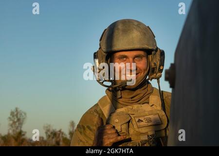 An Abrams tank and armoured personnel carrier fire during an army ...