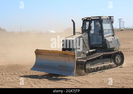 DOZER FIELD, PORT HUENEME, Calif. (Jan. 23,2018) A Seabee, assigned to ...