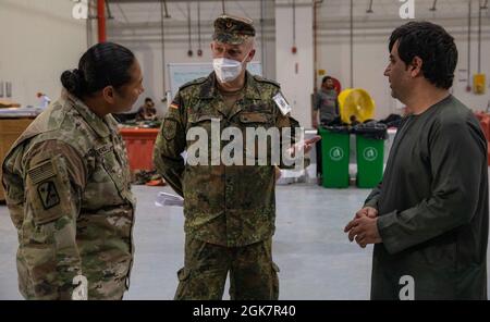 A Qatar Armed Forces soldier speaks on the radio to other members of ...