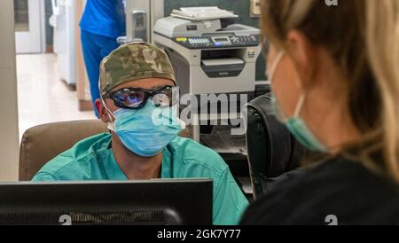 From left, U.S. Army Command Sgt. Maj. Christopher Shaiko, command ...