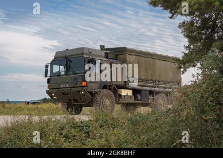 British army MAN SV 4x4 utility support vehicle in action on a military ...