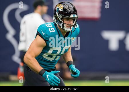 Jacksonville Jaguars tight end Luke Farrell, left, and center Luke ...