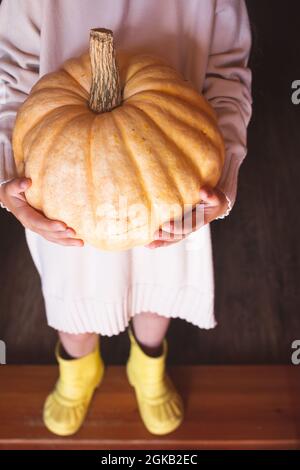 Ripe pumpkin on beige background Stock Photo - Alamy