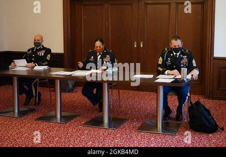 Command Sgt. Maj. Eric Bohannon lends a hand with planting trees at the ...