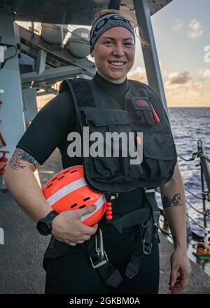 U.S. Navy search and rescue swimmers 3rd Officer Matthew Hadler and ...