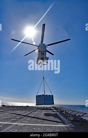 The Military Sealift Command dry cargo and ammunition ships conduct a ...