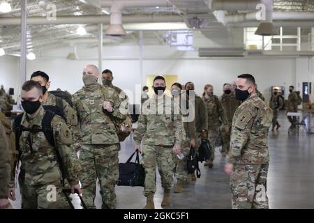 Soldiers of the 81st Stryker Brigade Combat Team stand in formation ...