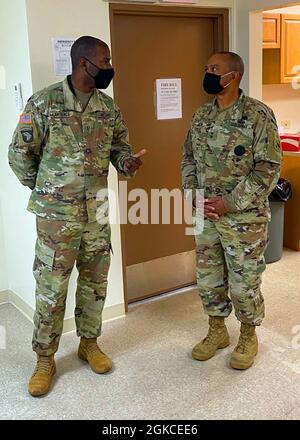 U.S. Army Pacific Deputy Commanding General Maj. Gen. Matthew W. McFarlane receives a plaque of ...