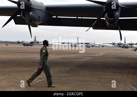 Maj. Laura Dempster, 41st Airlift Squadron C-130J pilot, prepares for ...