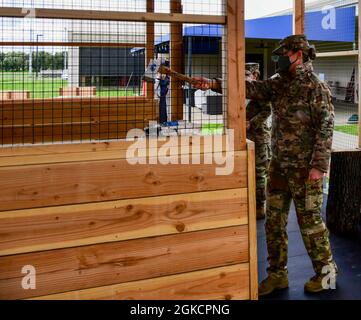 Col. Heather Fox, 9th Reconnaissance Wing commander, left, gives a ...