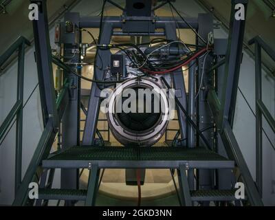 A T56 turboprop engine is mounted to a test cell inside a T-10 Hush ...