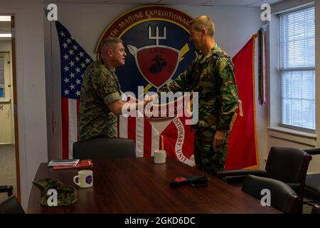 U.S. Marine Corps Col. Dennis W. Sampson, commanding officer of the ...