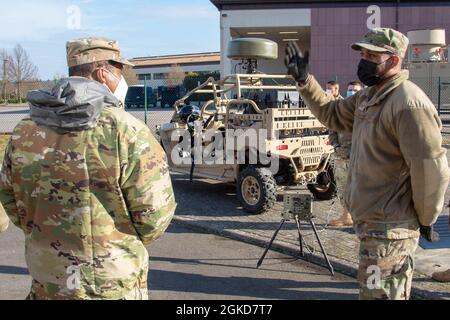 Leadership from the 435th Air Ground Operations Wing renders salutes as ...