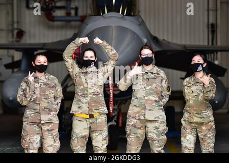 8th Maintenance Group Airmen pose for a photo during the 8th MXG's ...
