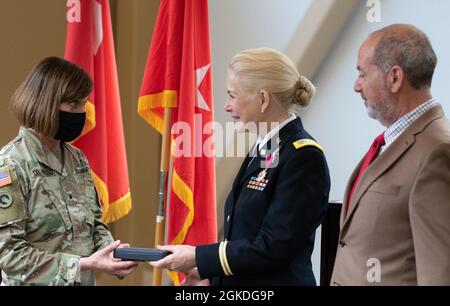 Gina Garabedian, the 311th Sustainment Command auditor, and Maj. Sonya ...