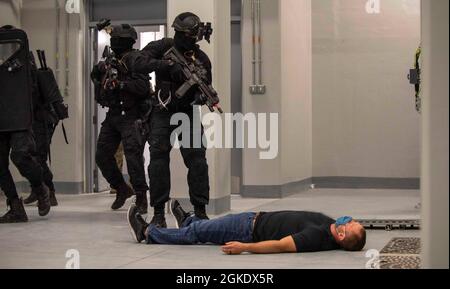 The Qatari Special Forces march in a parade in Doha, Qatar, to mark ...