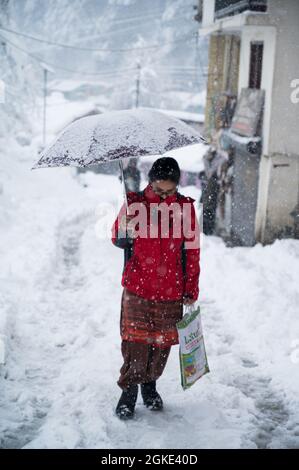 MANALI, INDIA - Jan 23, 2020: A young male on the street of Manali ...