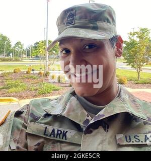 The Army Materiel Command’s Master Sgt. Clifton Williams receives a ...