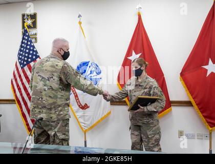 Staff Sgt. Jennifer Garland, contracting operations noncommissioned ...