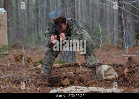 U.S. Marine Corps Capt. Kyle Echternacht practices Golf during the 11th ...