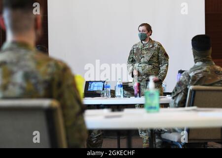 Col. Heather Fox, 9th Reconnaissance Wing commander, left, gives a ...