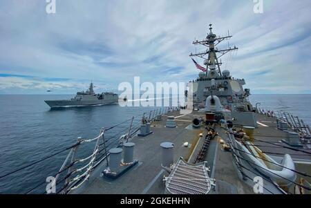 USS Russell (DDG 59) with INS Sumitra (P59) during a passex exercise ...