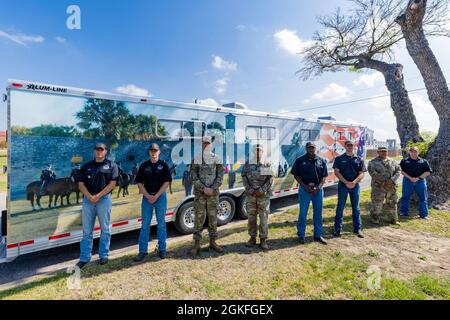 Soldiers with the Fort Sam Houston Caisson Section carry the flag ...