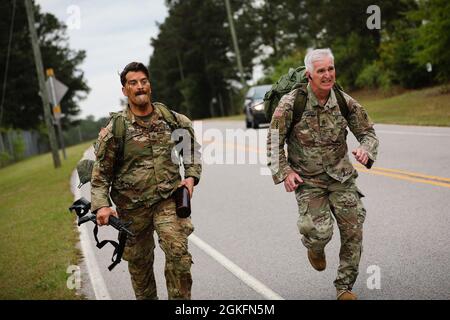 U.S Army Soldiers from the 308th Chemical Company wipe each others mask ...