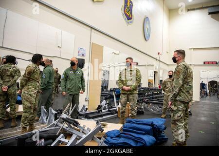U.S. Air Force Airmen of the 501st Combat Support Wing present a salute ...