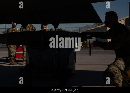 Airmen from the 757th Aircraft Maintenance Squadron, carry a training ...