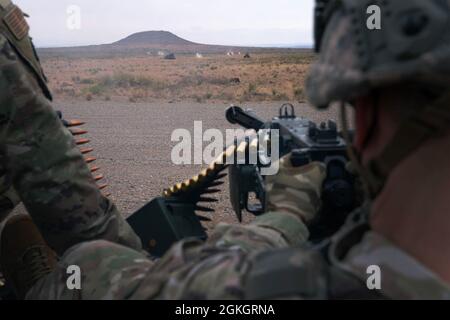 A 149th Fighter Wing member fires a 50 caliber machine gun while ...