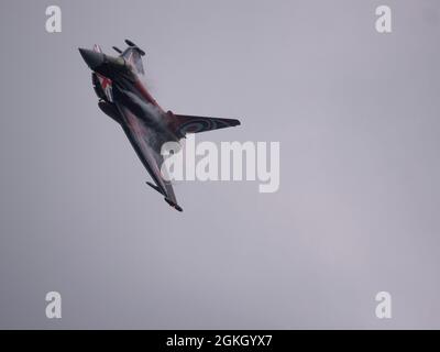 RAF Typhoon fighter jet rolling into inverted position with full ...