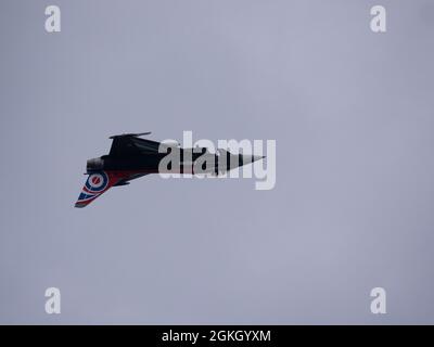Inverted RAF Typhoon fighter jet in Black Jack colours at the 2021 ...