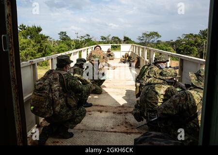 A group of Japanese soldiers during a training maneuver in the field in ...