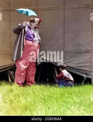 1920s 1930s CIRCUS PERFORMER CLOWN DRESSED AS KEYSTONE COP LOOKING AT ...