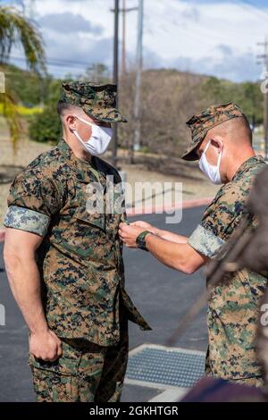 U.S. Marine Corps Col. Coby Moran, left, the outgoing commanding ...