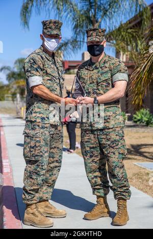 Brig. Gen. Jason L. Morris, right, the Commanding General of Marine ...