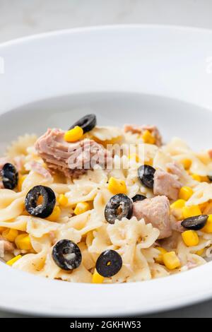 Pasta Farfalle with fresh Tuna fish and tomato Stock Photo - Alamy