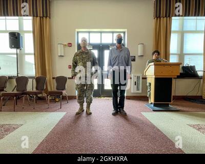 Col. Carl Magnusson, the 914th Air Refueling Wing commander, presents ...
