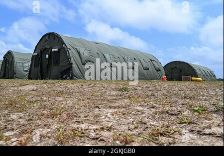 Tents are set in a field at the Agile Flag 21-2 experiment at Naval ...