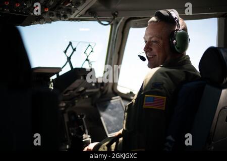 U.S. Air Force Col. Corey Simmons, center, 60th Air Mobility Wing ...