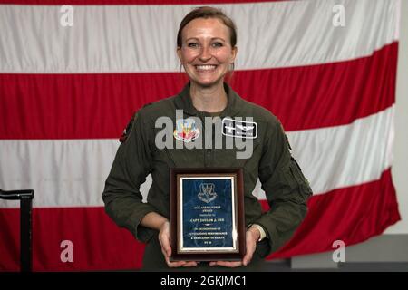 Capt. Taylor Bye poses with Air Force Chief of Staff Gen. CQ Brown, Jr ...