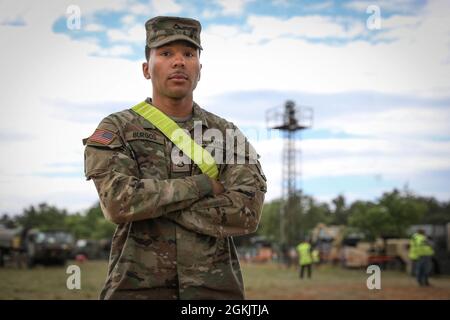 Soldiers from the 317th Support Maintenance Company connect hoses on ...