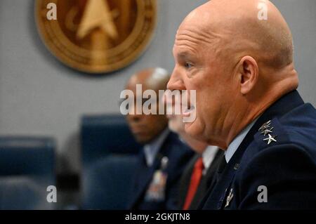 Chief of Space Operations Gen. John W. “Jay” Raymond shares a joke with ...