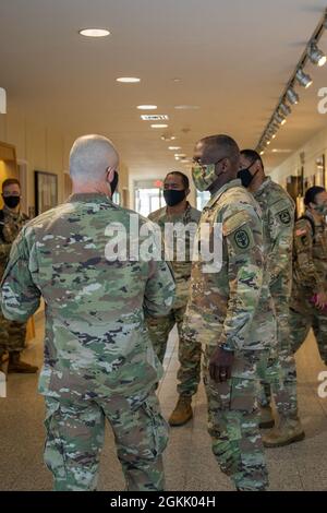 Col. Clinton Murray (right), WRAIR commander, provides an introductory ...