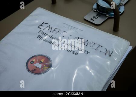 OKINAWA, Japan (May 12, 2021) Rear Adm. Fred Kacher, left, salutes Rear ...