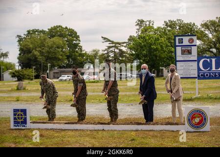 Attendees witness the official ground breaking ceremony of the Marine ...