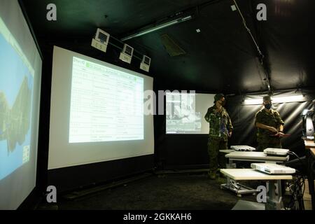 U.S. Marine Corps Capt. Kai Gamble, the air officer of Battalion ...