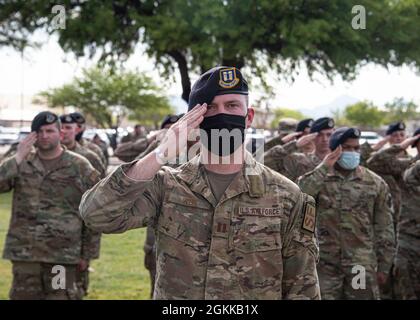Defenders from the 355th Security Forces Squadron stand in formation ...