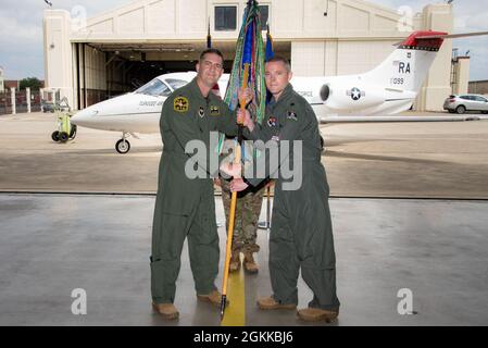 Col. Robert Moschella, 12th Operations Group commander, speaks during ...